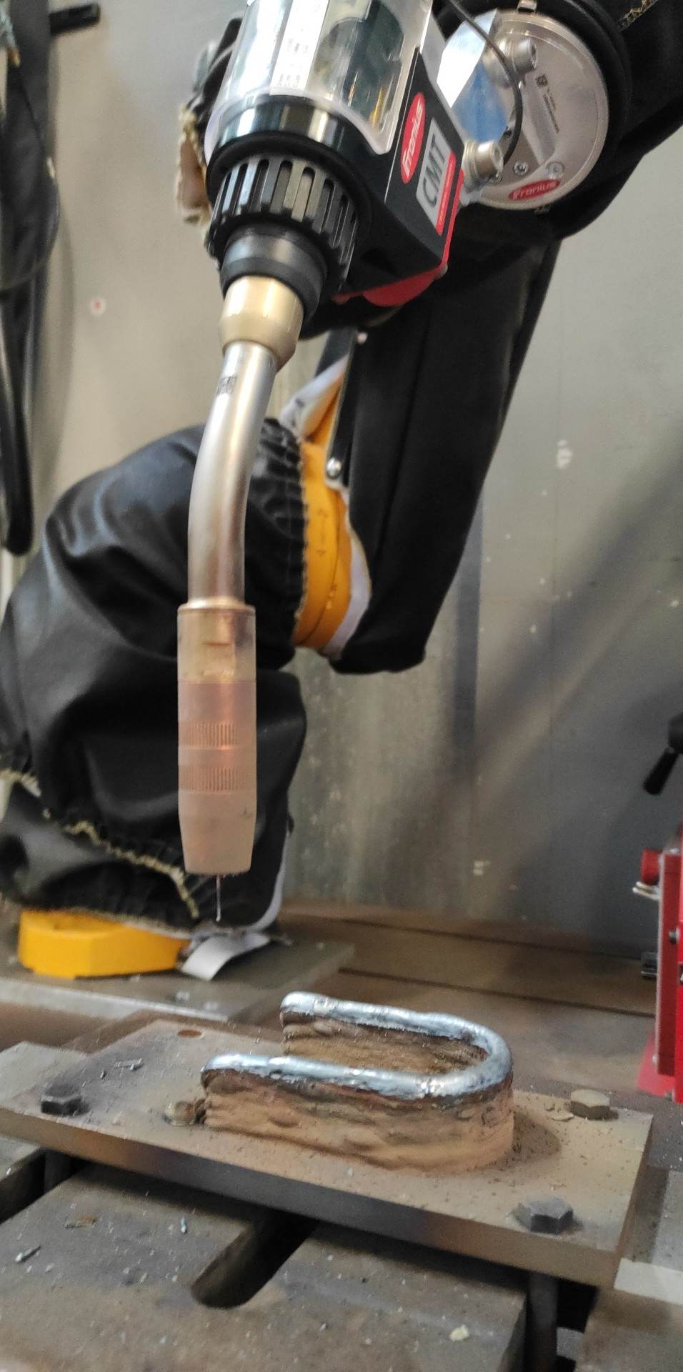 Design and implementation of a robotic cell using a Cable–Driven ...